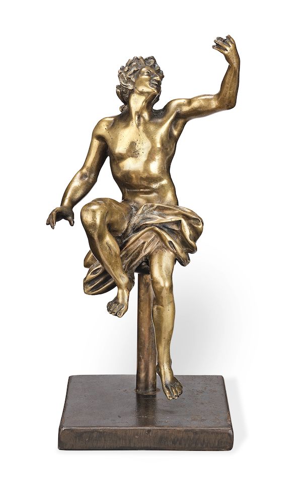 Bonhams : A polished bronze figure of a draped seated classical figure ...