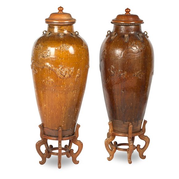 Bonhams : A pair of mataban-style earthenware vases with wood covers ...