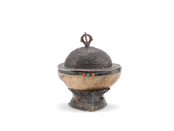 Bonhams : A white metal-mounted kapala, cover and stand Tibet, 19th ...