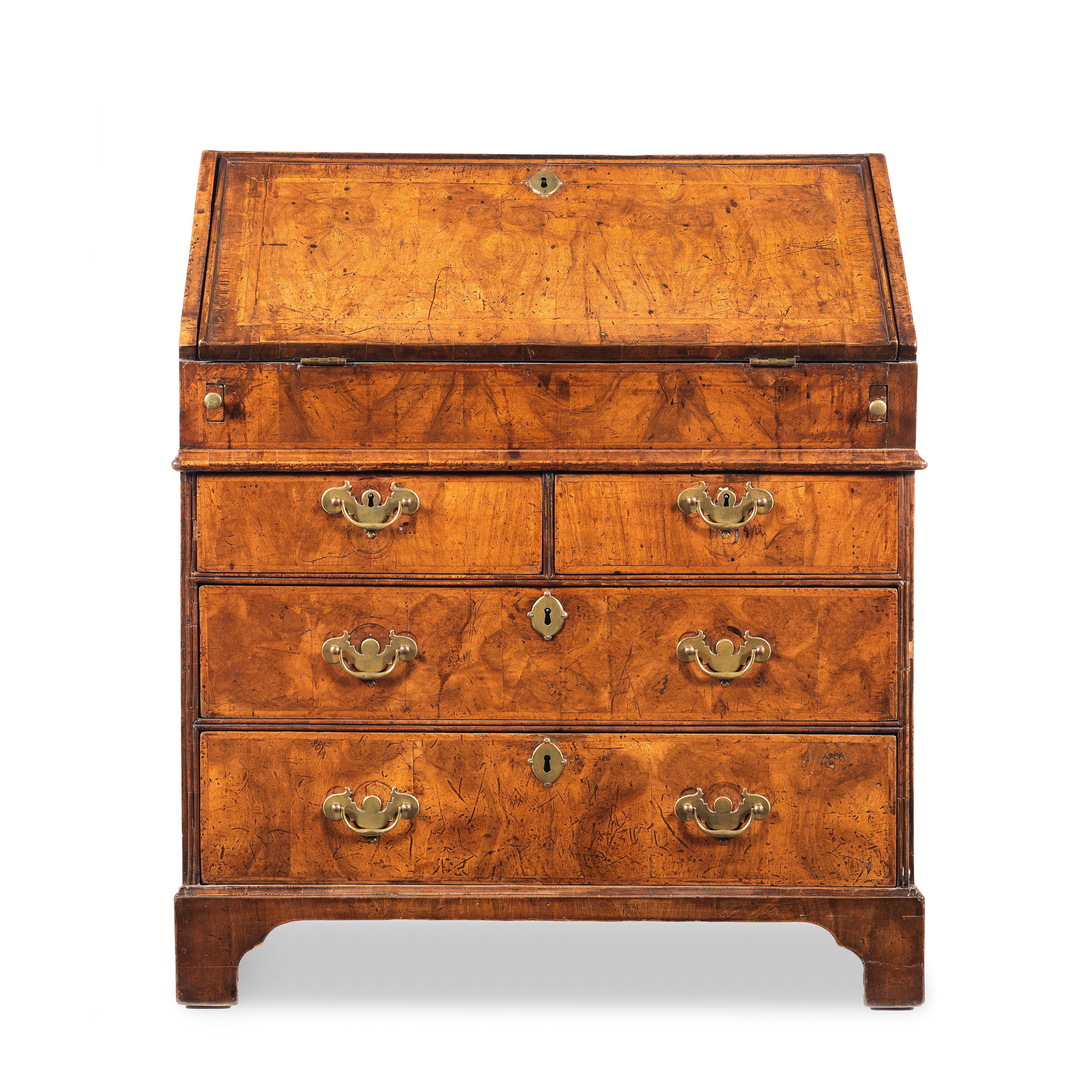Bonhams : A George I Walnut crossbanded and featherbanded Bureau