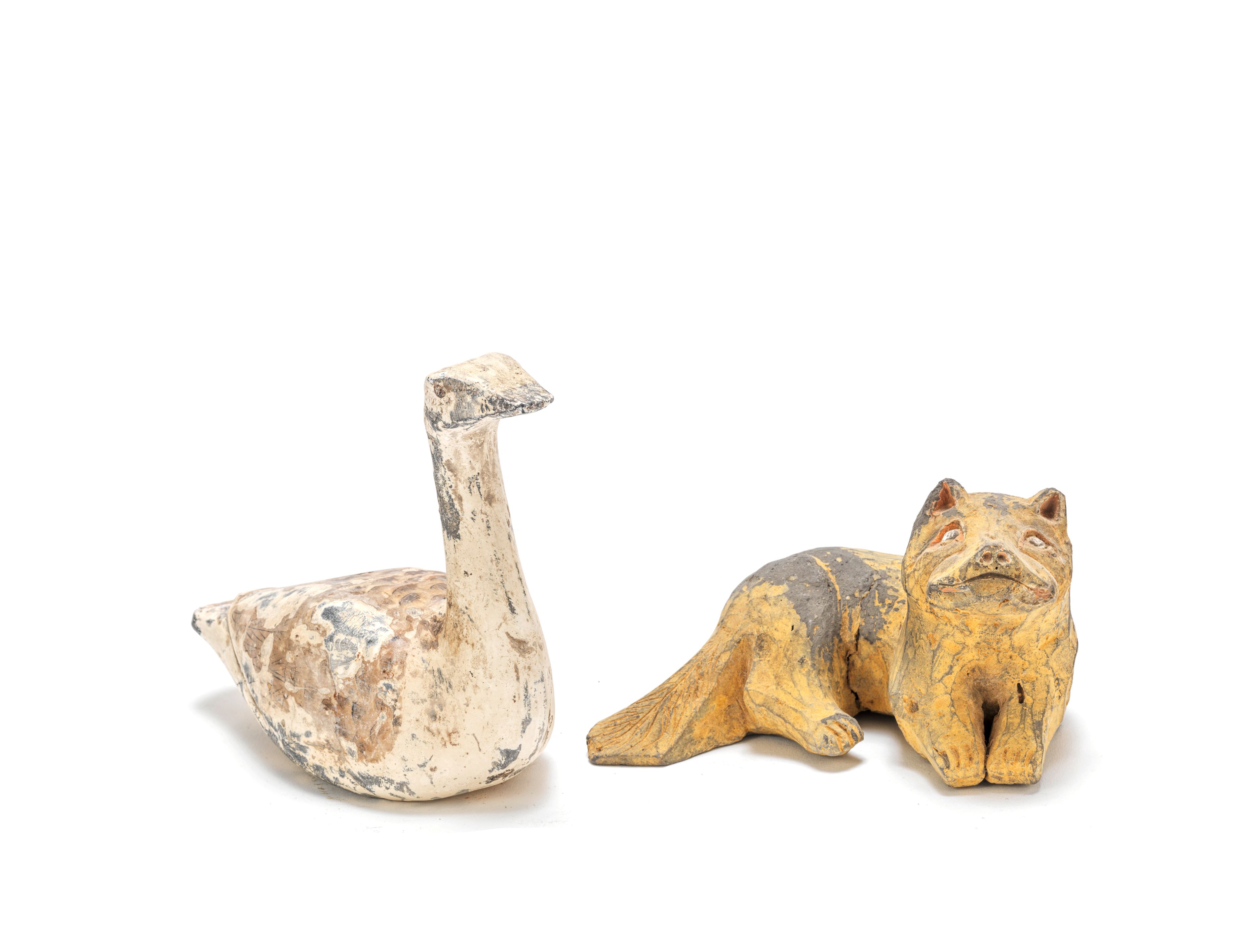 Bonhams : A rare painted pottery model of a wild duck and a painted ...