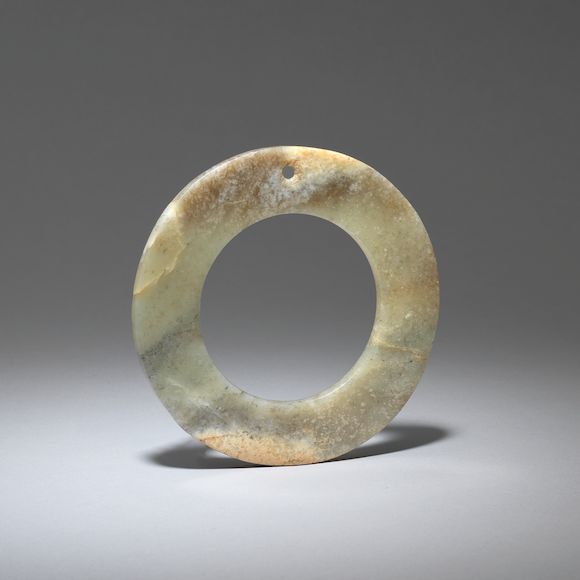 Bonhams : A jade disc, bi Ming Dynasty or earlier (2)