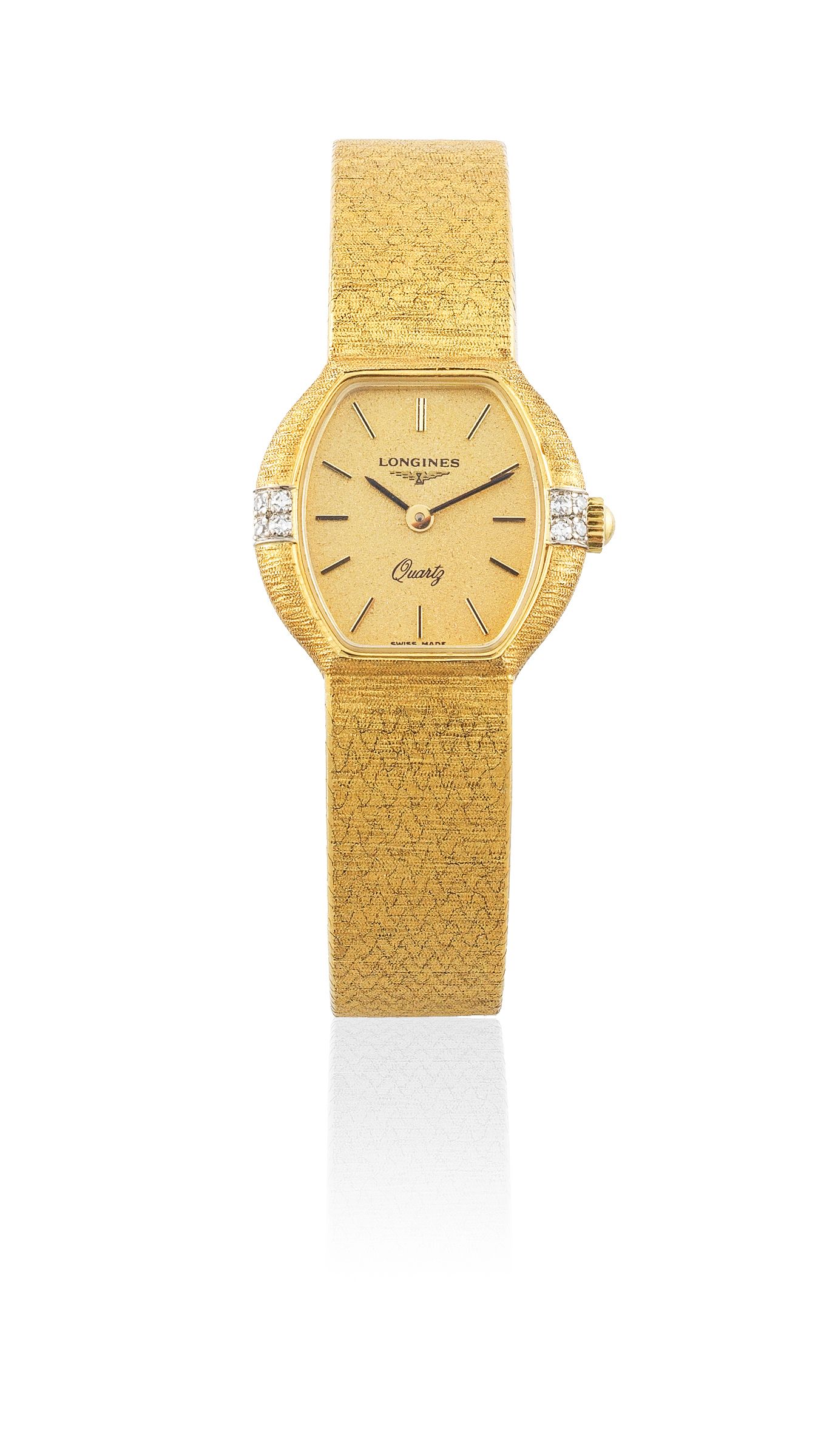 Bonhams : Longines. A lady's 18K gold and diamond set quartz oval ...