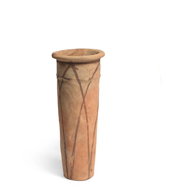 Bonhams : An Egyptian pottery 'net' jar