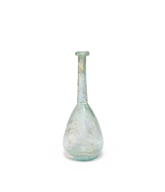 Bonhams : A Roman pale green glass flask