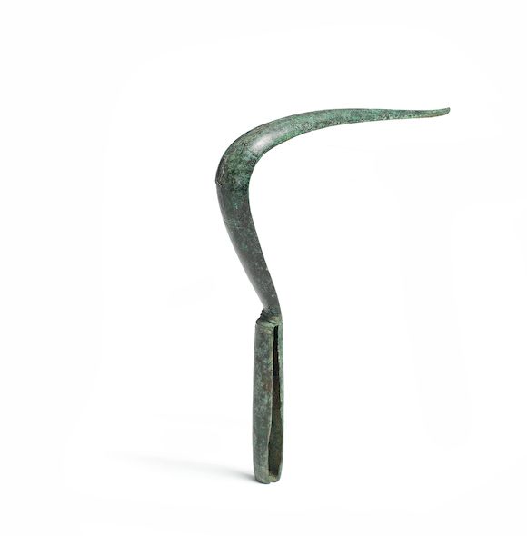 Bonhams : A Roman bronze strigil