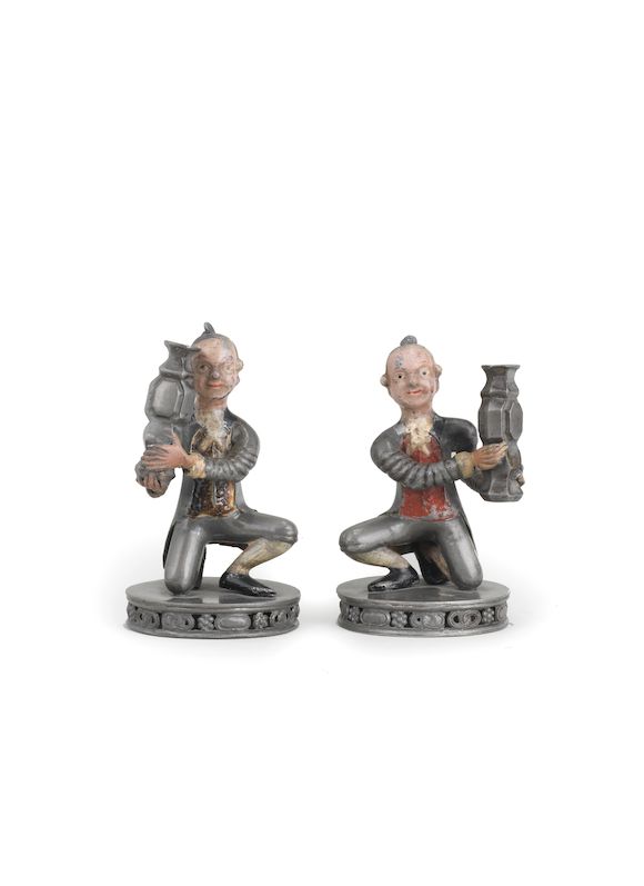 Bonhams : AN UNUSUAL PAIR OF PAINTED PEWTER FIGURES OF EUROPEAN TRIBUTE ...