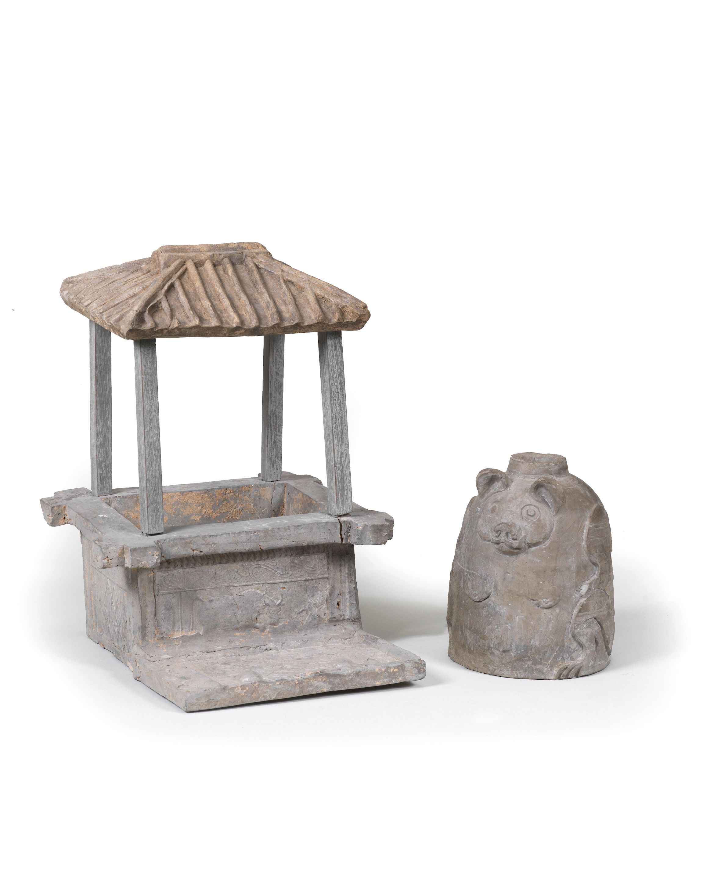 Bonhams : A GREY POTTERY MODEL OF A ROOFED WELLHEAD AND A GREY POTTERY ...