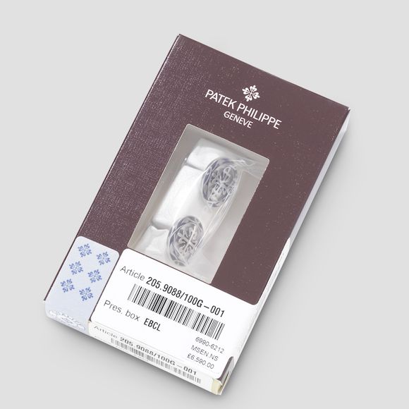 Bonhams : Patek Philippe. A pair of factory sealed 18K white gold and ...