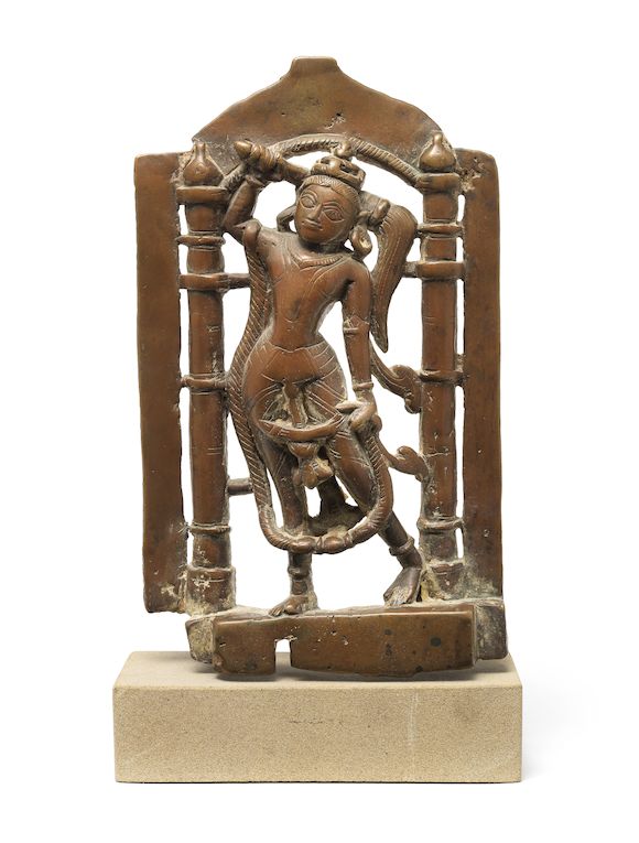 Bonhams : A copper alloy figure of a Chauri Bearer Western India, 15th ...