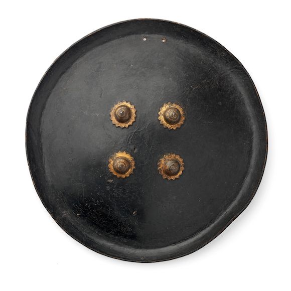 Bonhams : A lacquered hide shield (dhal) Punjab, circa 1830-50