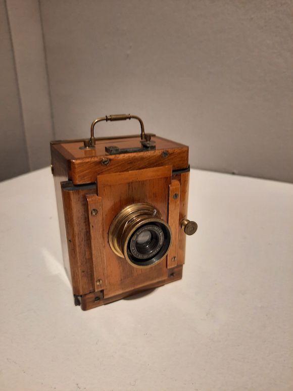Bonhams : A miniature Wood-Body Boxform Camera,