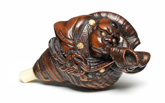 Bonhams : A wood netsuke of Benkei By Mitsushige, early 19th century