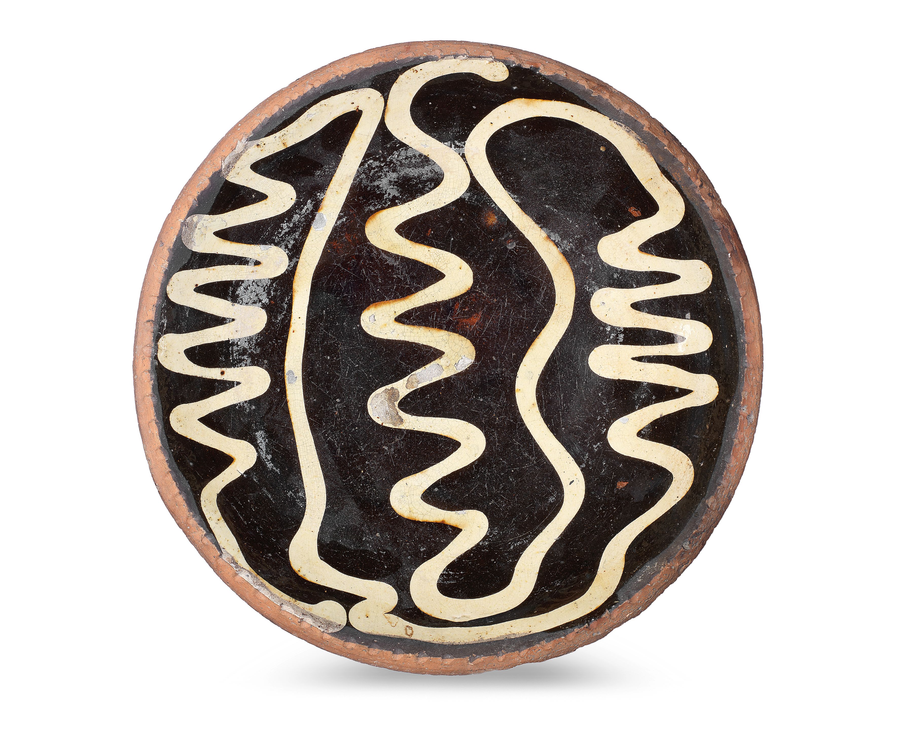 Bonhams : A slipware dish, 18th century