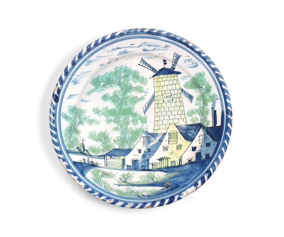 Bonhams : A very rare delftware charger, dated 1703