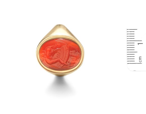 Bonhams : A carnelian intaglio depicting Hephaistus and the Armour of ...