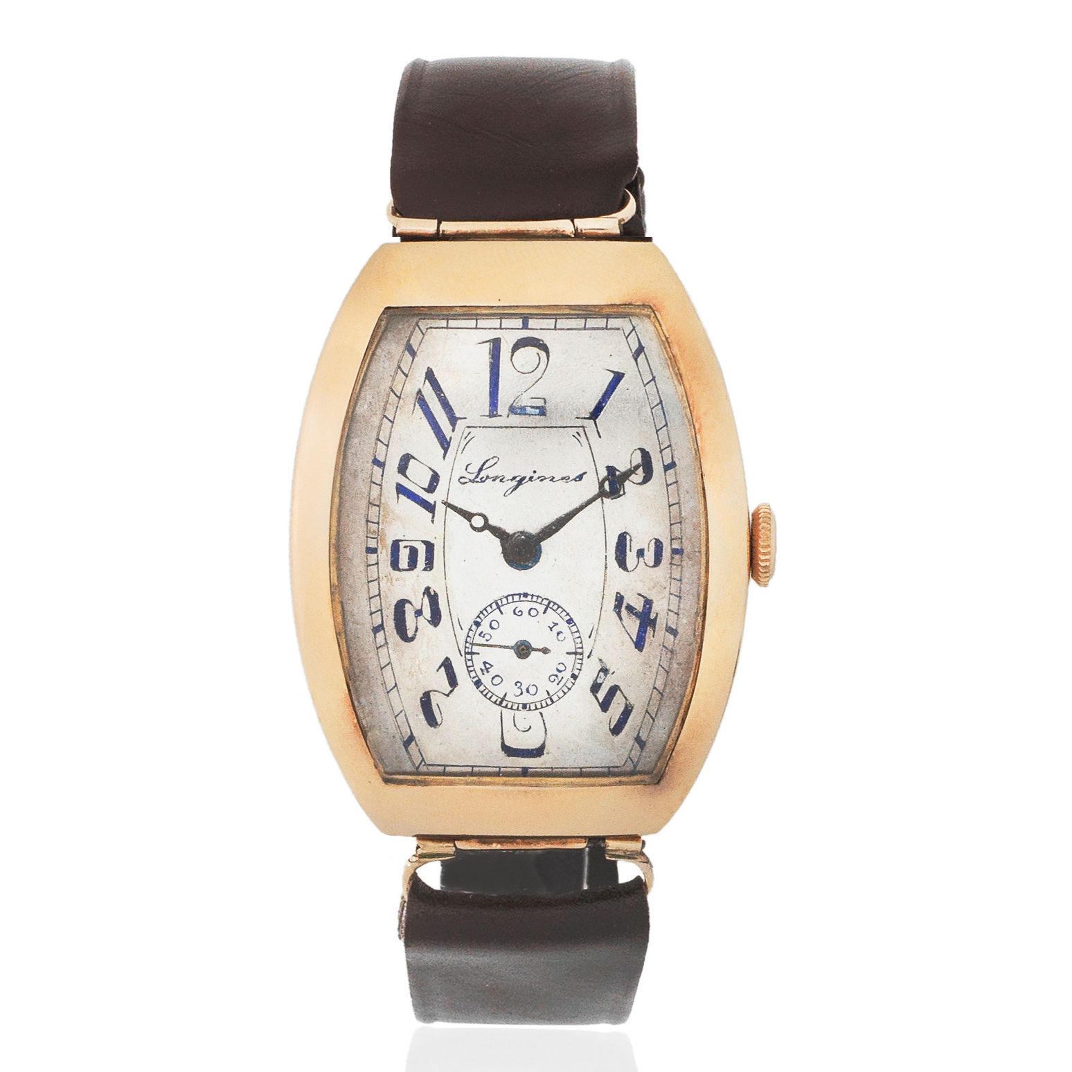 Bonhams : Longines. A 14K gold manual wind tonneau form wristwatch ...