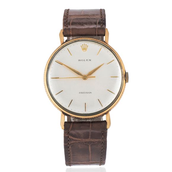 Bonhams : Rolex. A 9K gold manual wind wristwatch with milled bezel ...