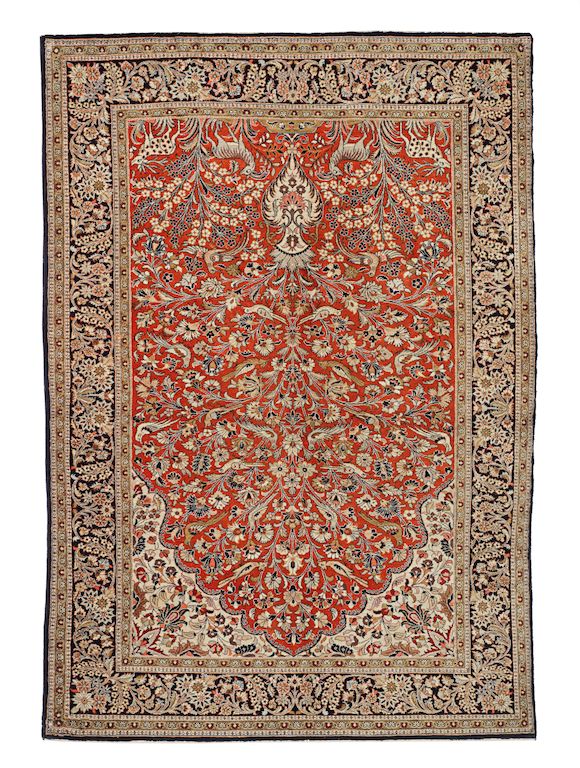 Bonhams : A Ghom red ground prayer rug, Central Persia 159cm x 108cm