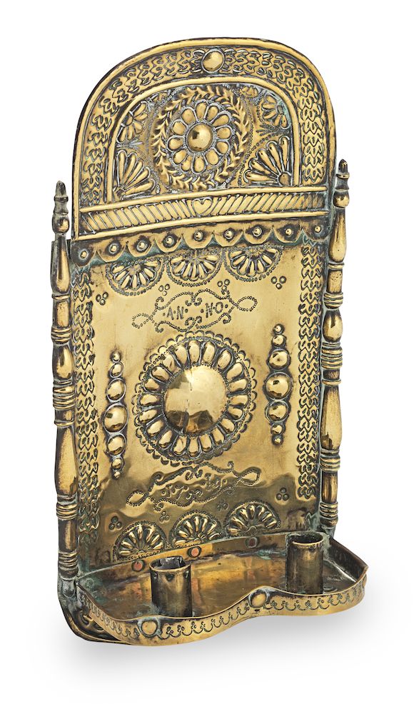 Bonhams : A rare early 18th century sheet and cast brass twin-light ...