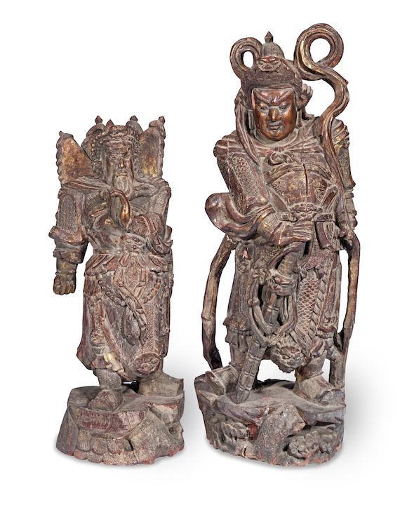 Bonhams : TWO RED LACQUERED AND GILT CARVED WOOD GUARDIAN FIGURES Late ...
