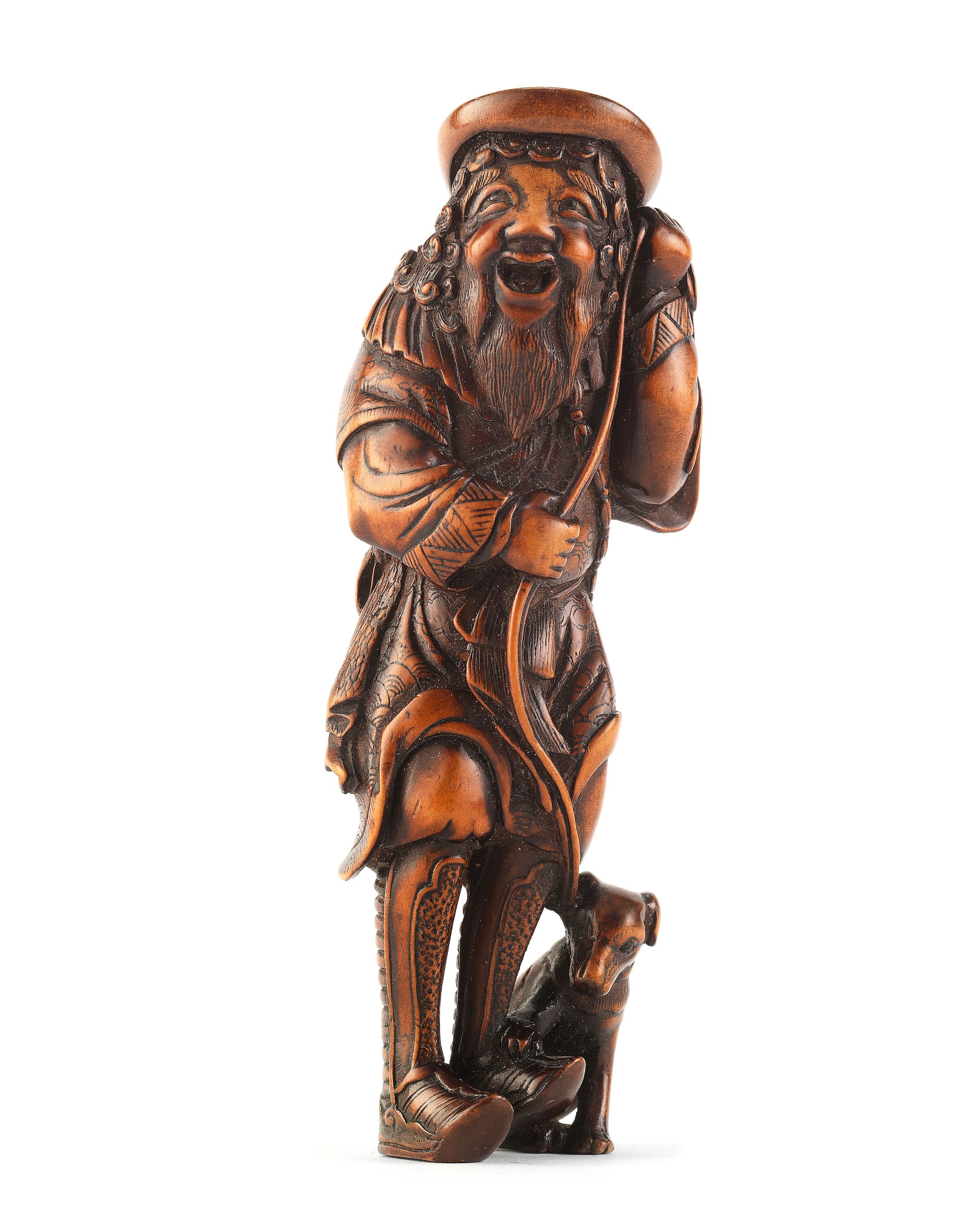 A Tall wood netsuke of a Dutchman and dog - auctions & price archive