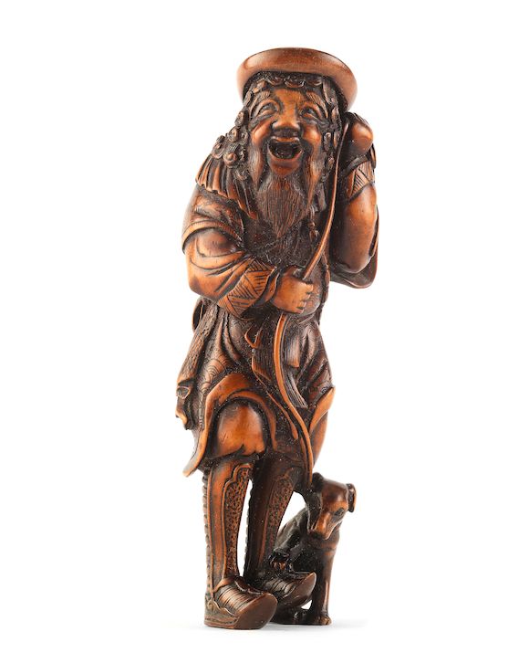 Bonhams : A Tall wood netsuke of a Dutchman and dog By Ikko, Edo period ...