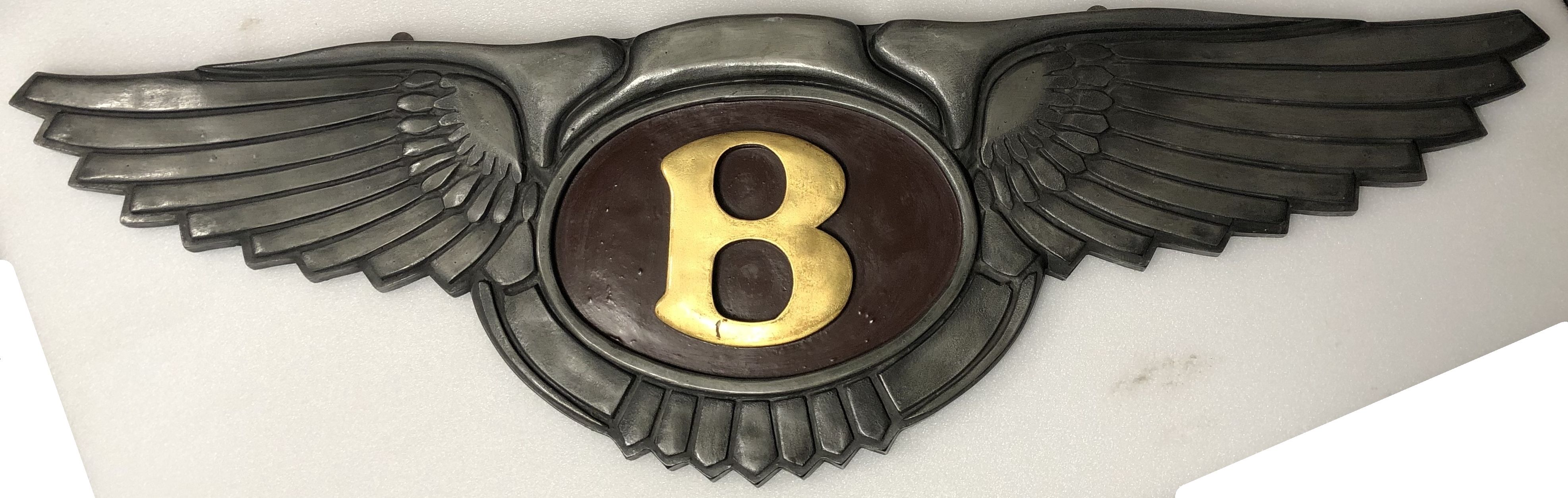 Bonhams Cars : A 'Bentley' garage display emblem,