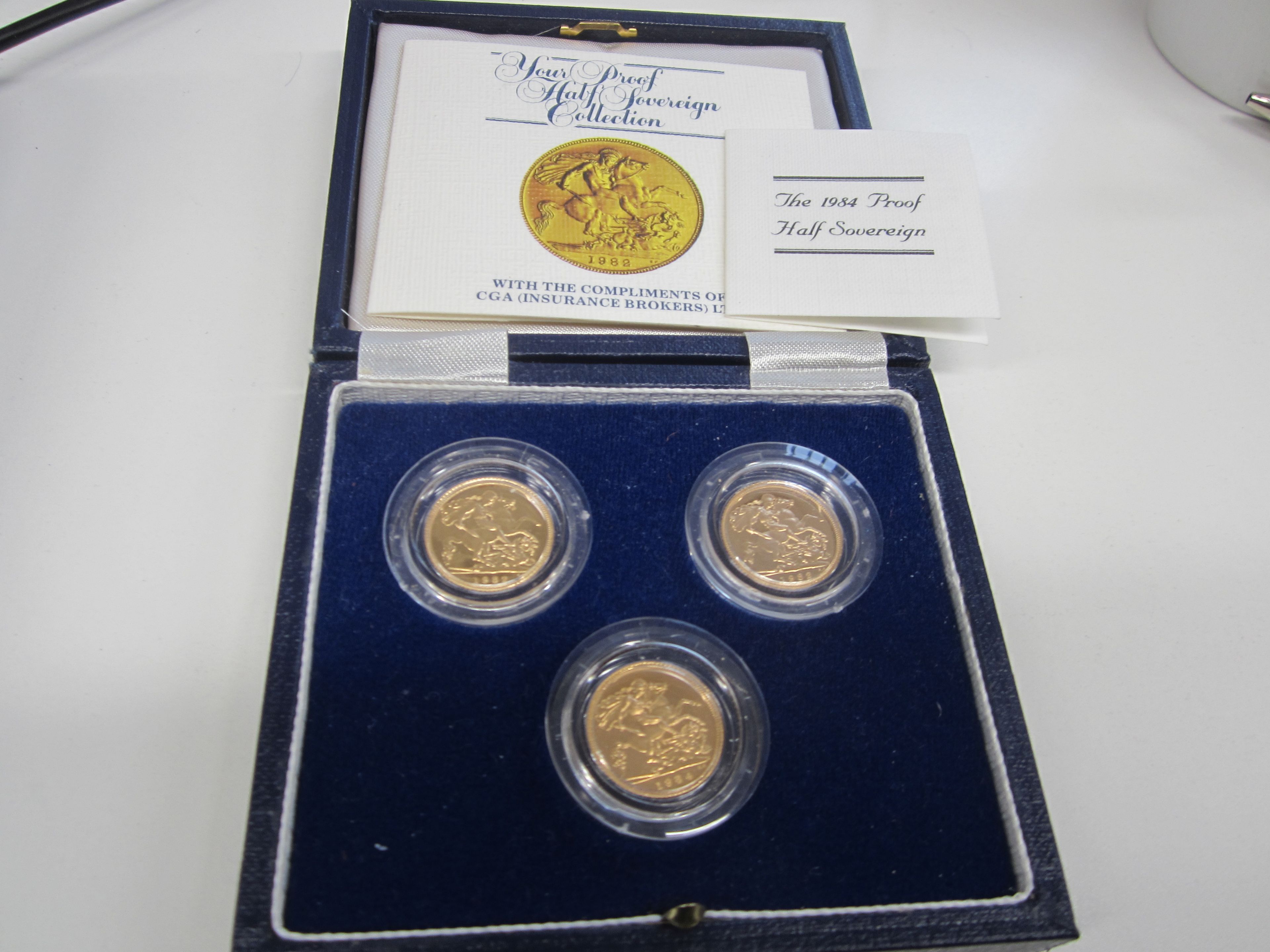 Bonhams : Elizabeth II, proof half sovereigns, 1982 (2), 1984
