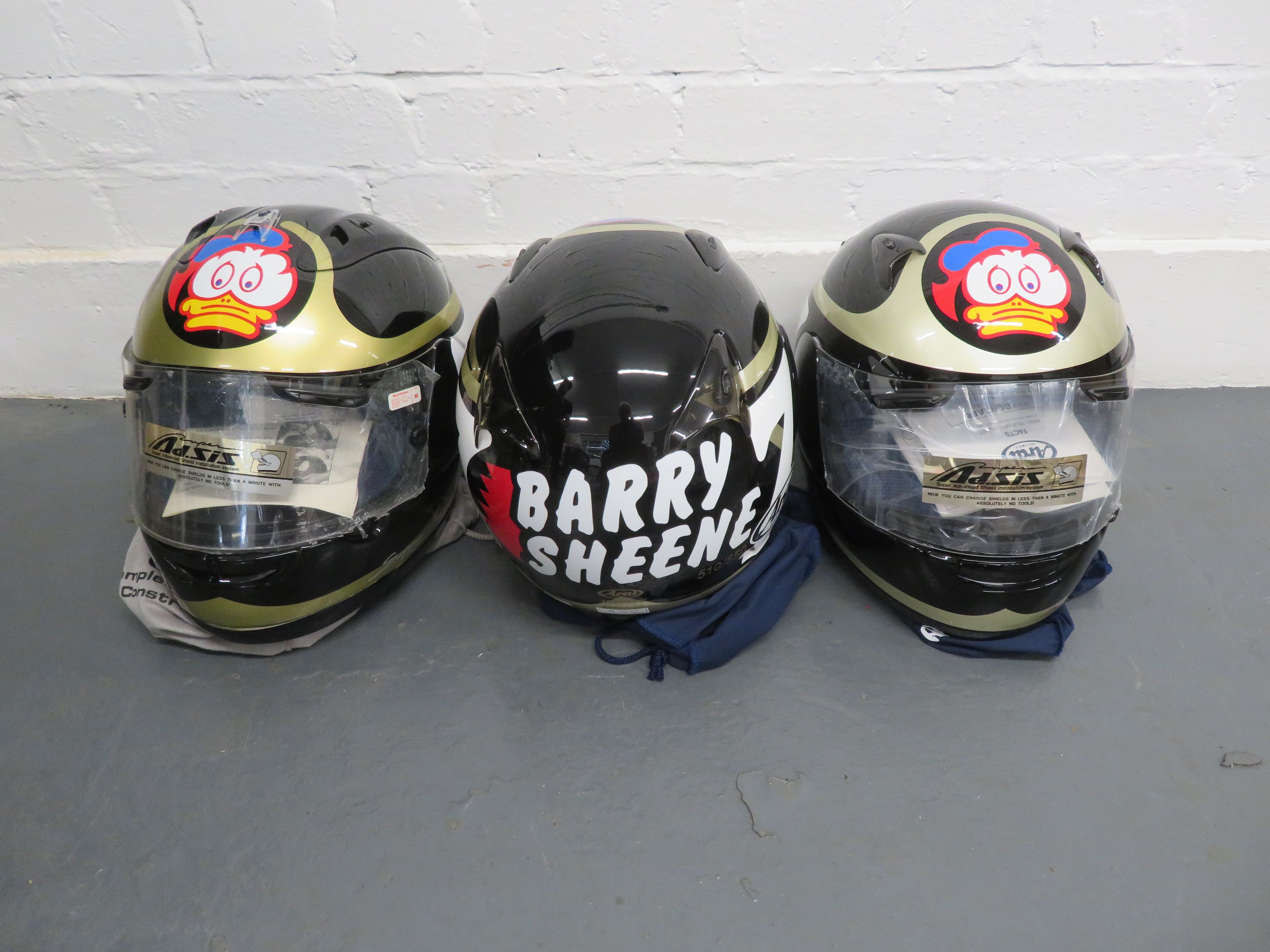 Bonhams Cars : Three Arai Barry Sheene replica helmets ((3))