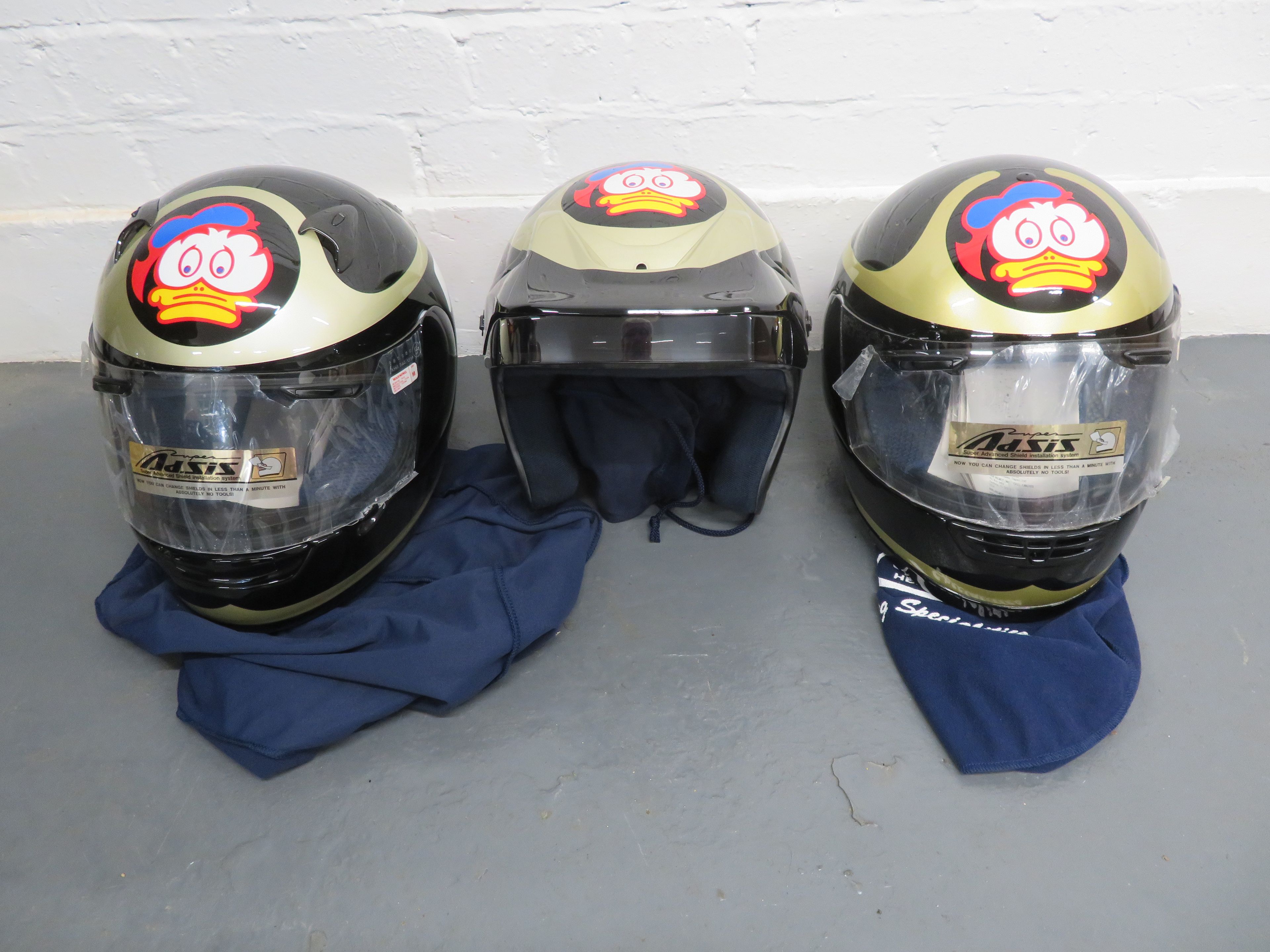 Bonhams Cars : Three Arai Barry Sheene replica helmets ((3))