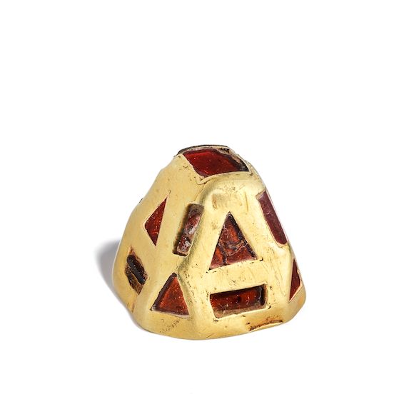 Bonhams : An Anglo-Saxon gold and garnet pyramidal mount