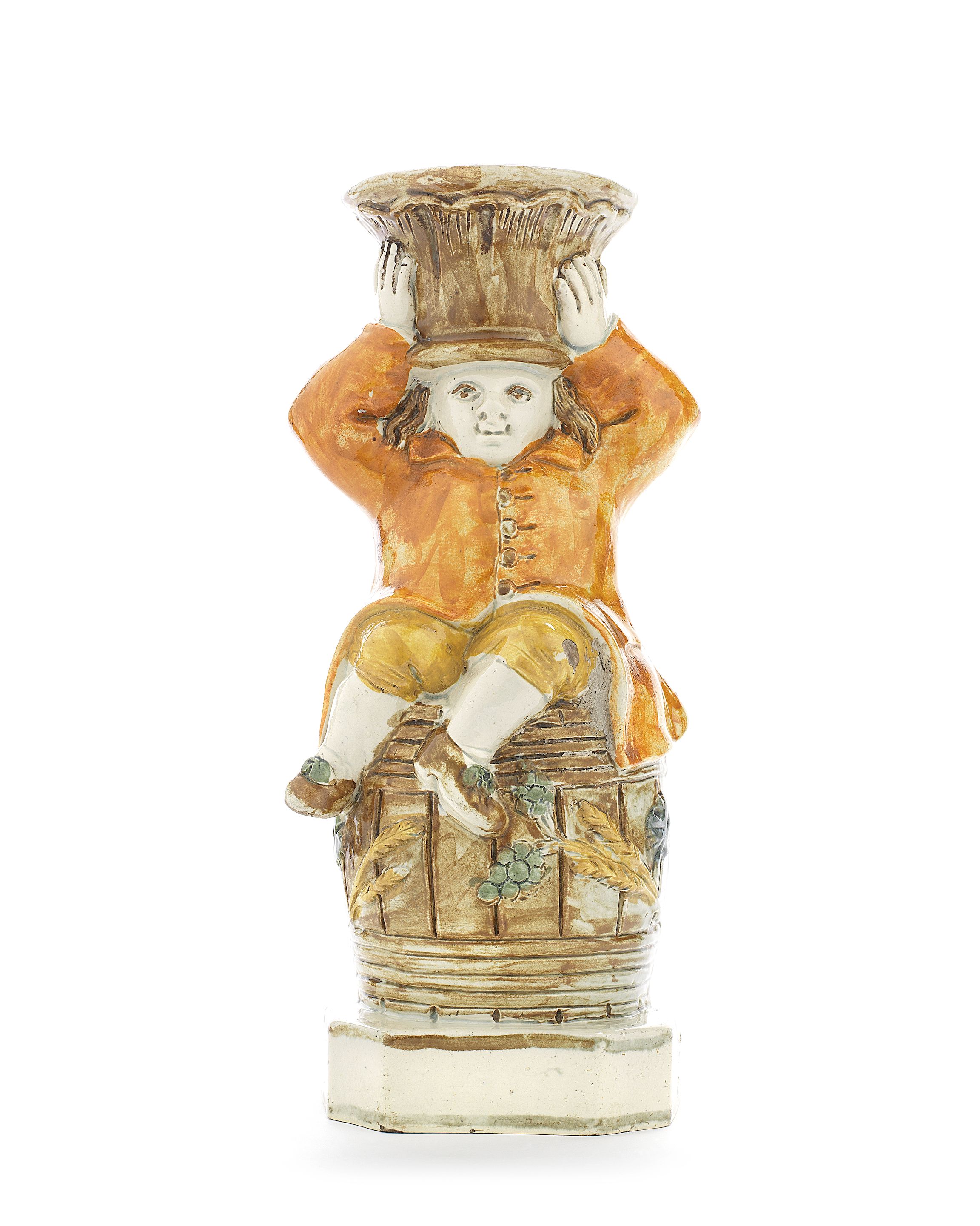 Bonhams : A rare Prattware 'Boy On A Barrel' Toby Jug, circa 1800