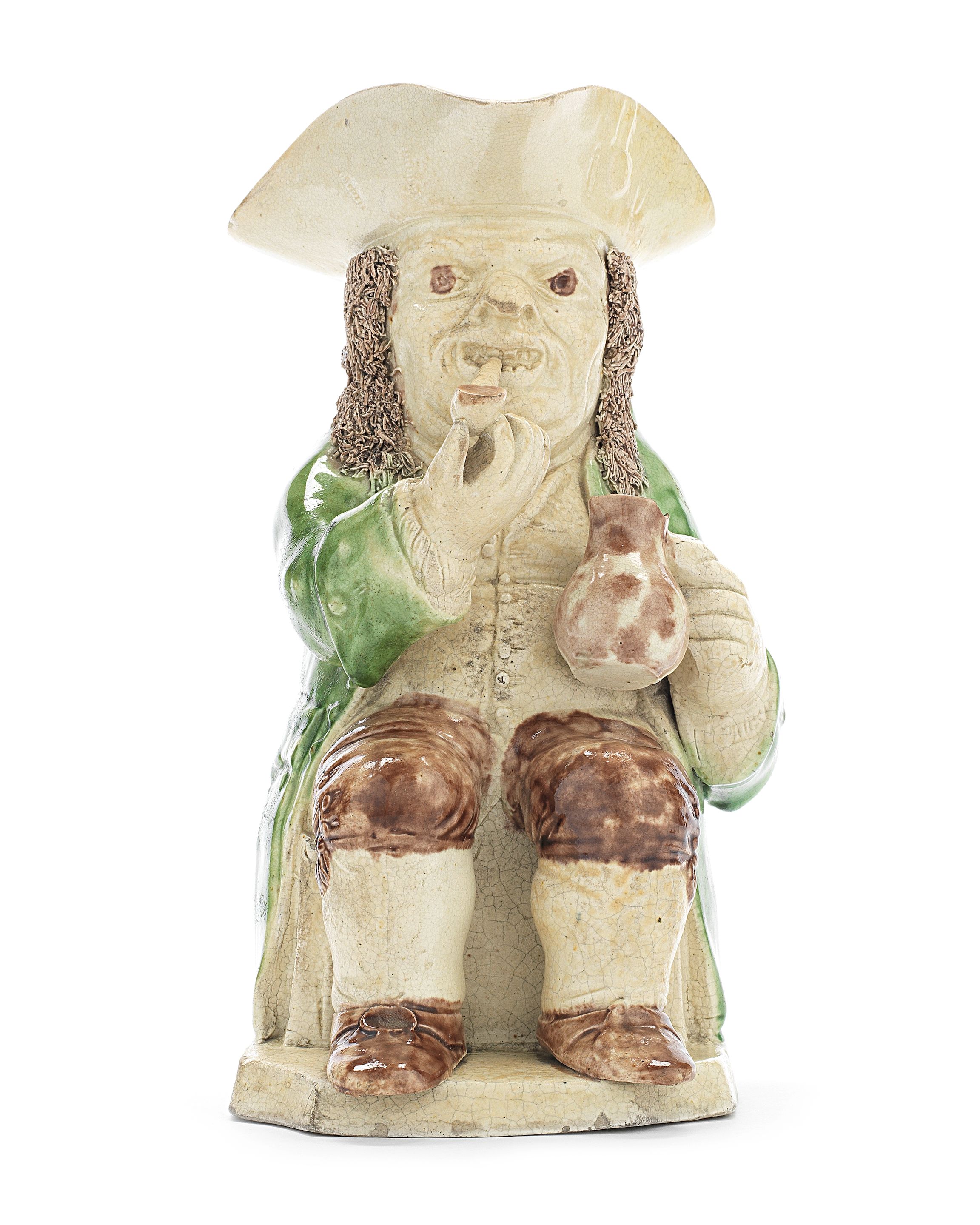 Bonhams : A very rare creamware 'Step' Toby jug, circa 1780