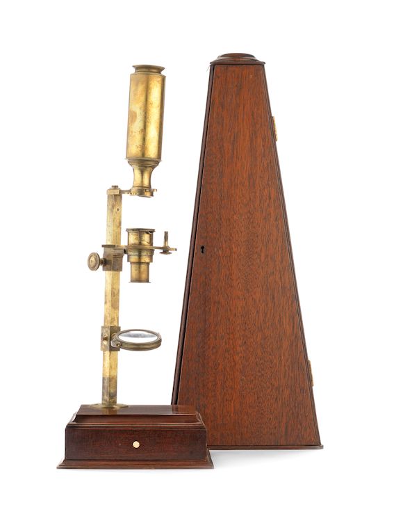 Bonhams : A George Adams brass Cuff-type microscope, English,