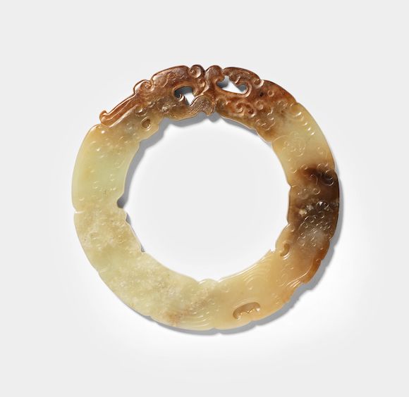 Bonhams : A RARE ARCHAISTIC YELLOWISH AND RUSSET JADE 'DOUBLE-DRAGON ...