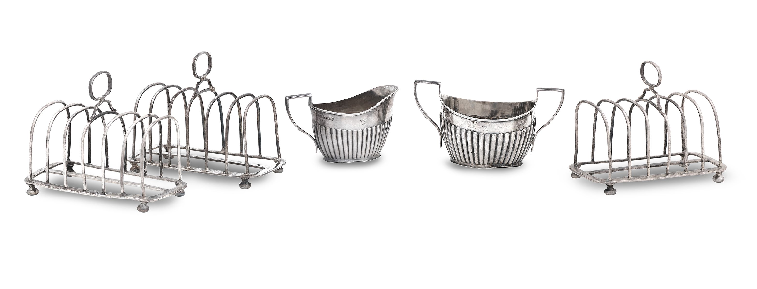 Bonhams : A set of three Victorian seven-bar silver toast-racks by ...