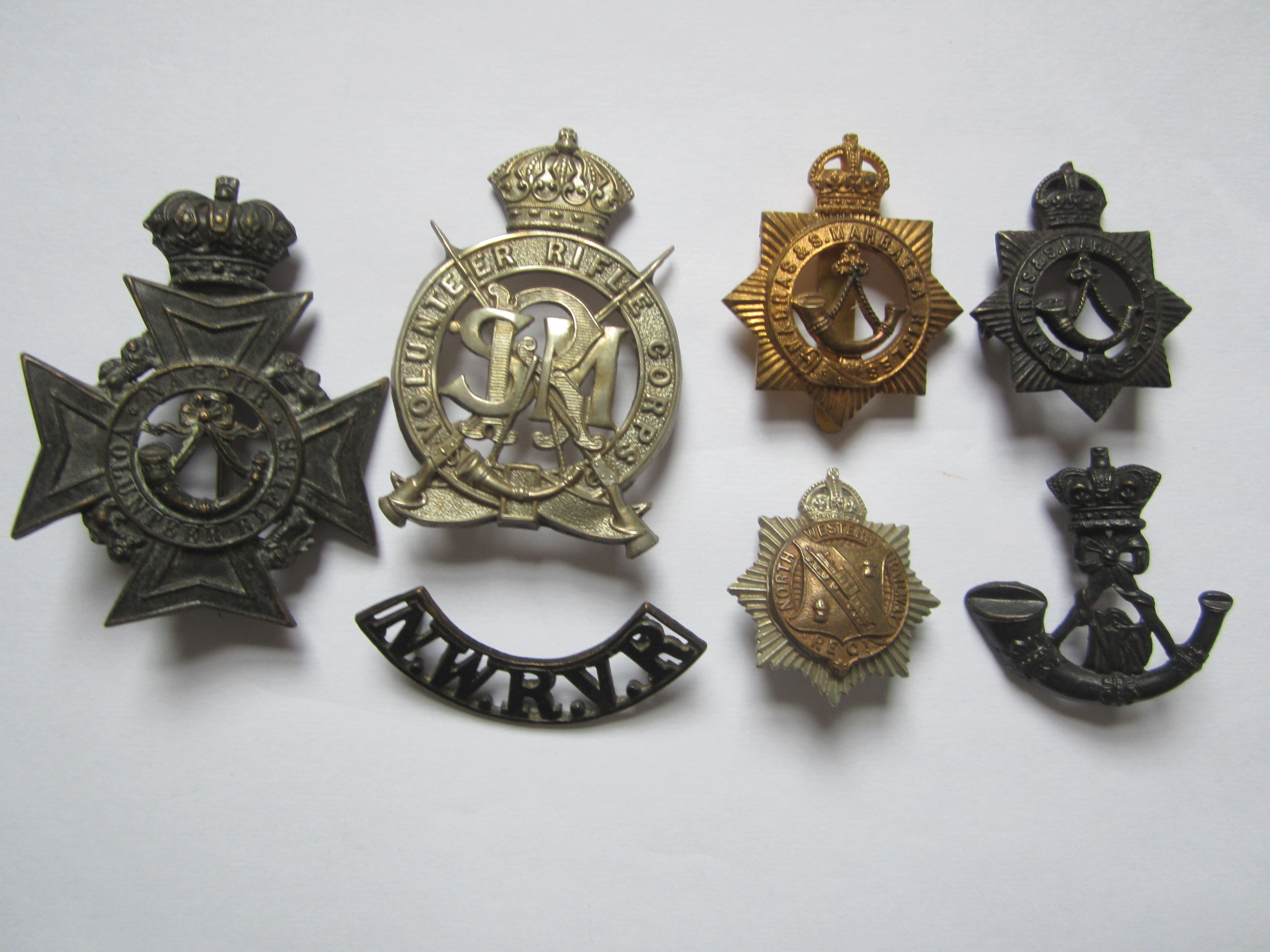 Bonhams : Indian Army Auxiliary Forces Headdress Badges,