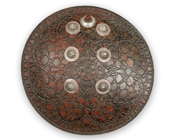 Bonhams : A Lacquered hide shield North India, 18th/ 19th Century