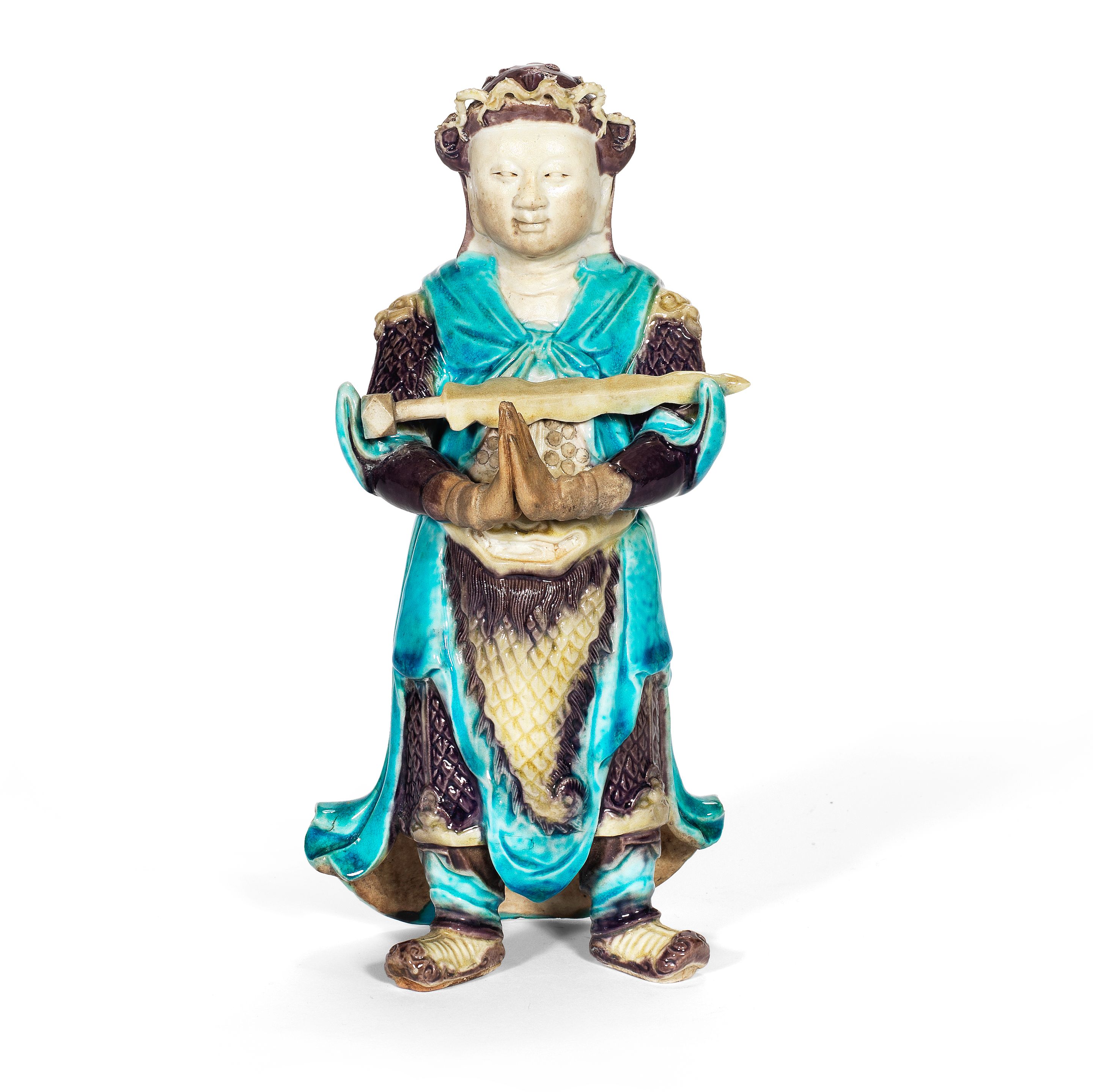 Bonhams : A FAHUA GLAZED BISCUIT FIGURE OF WEITUO Kangxi