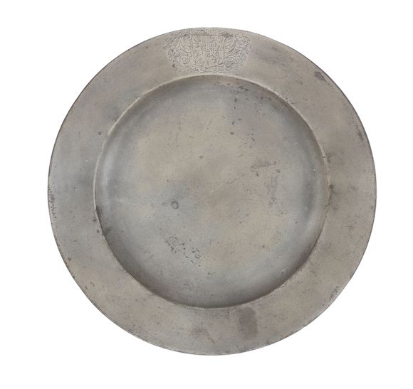 Bonhams : A George II pewter plain rim plate, circa 1750