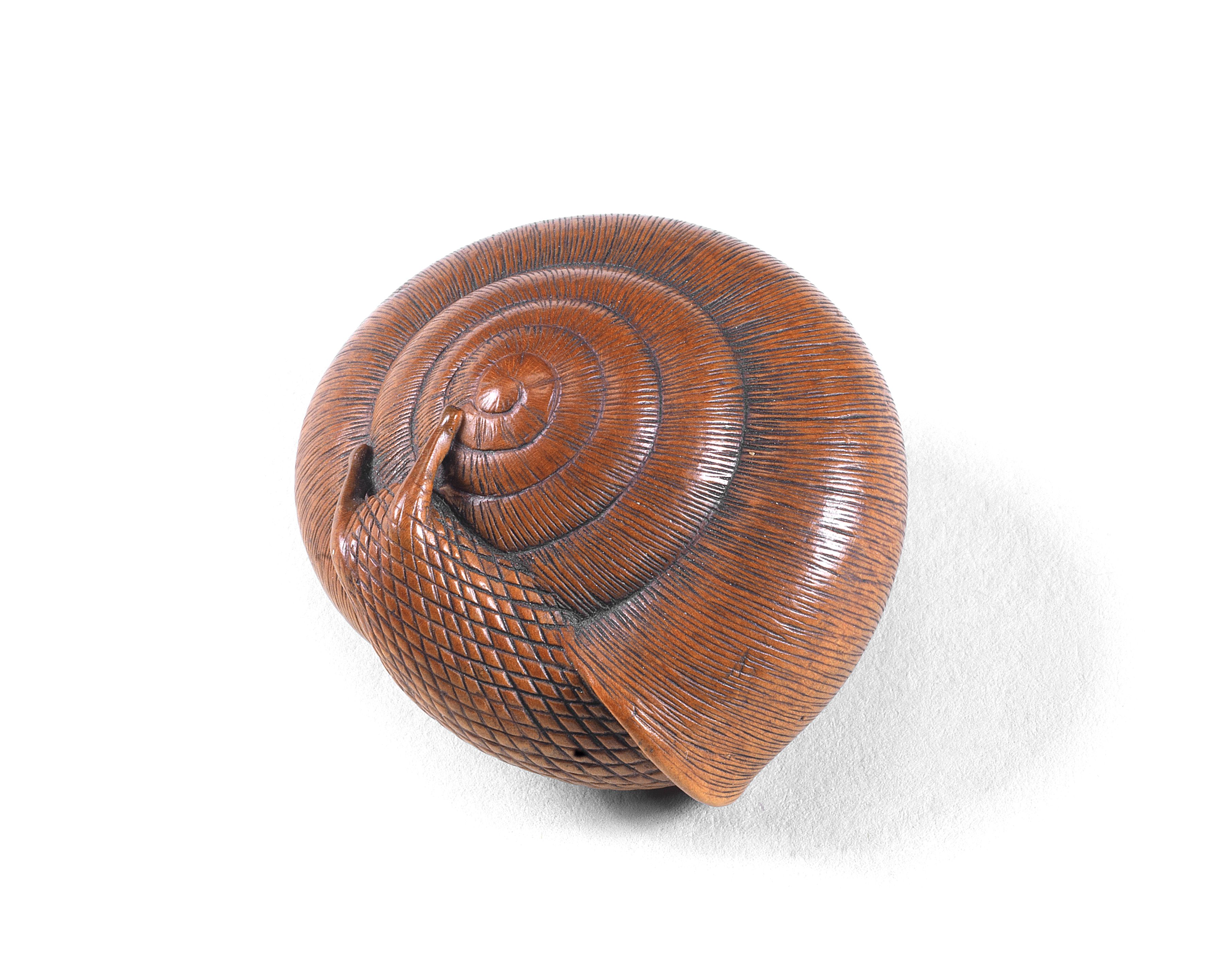 Bonhams : A wood netsuke of a snail By Tadayuki, Nagoya, Edo period ...