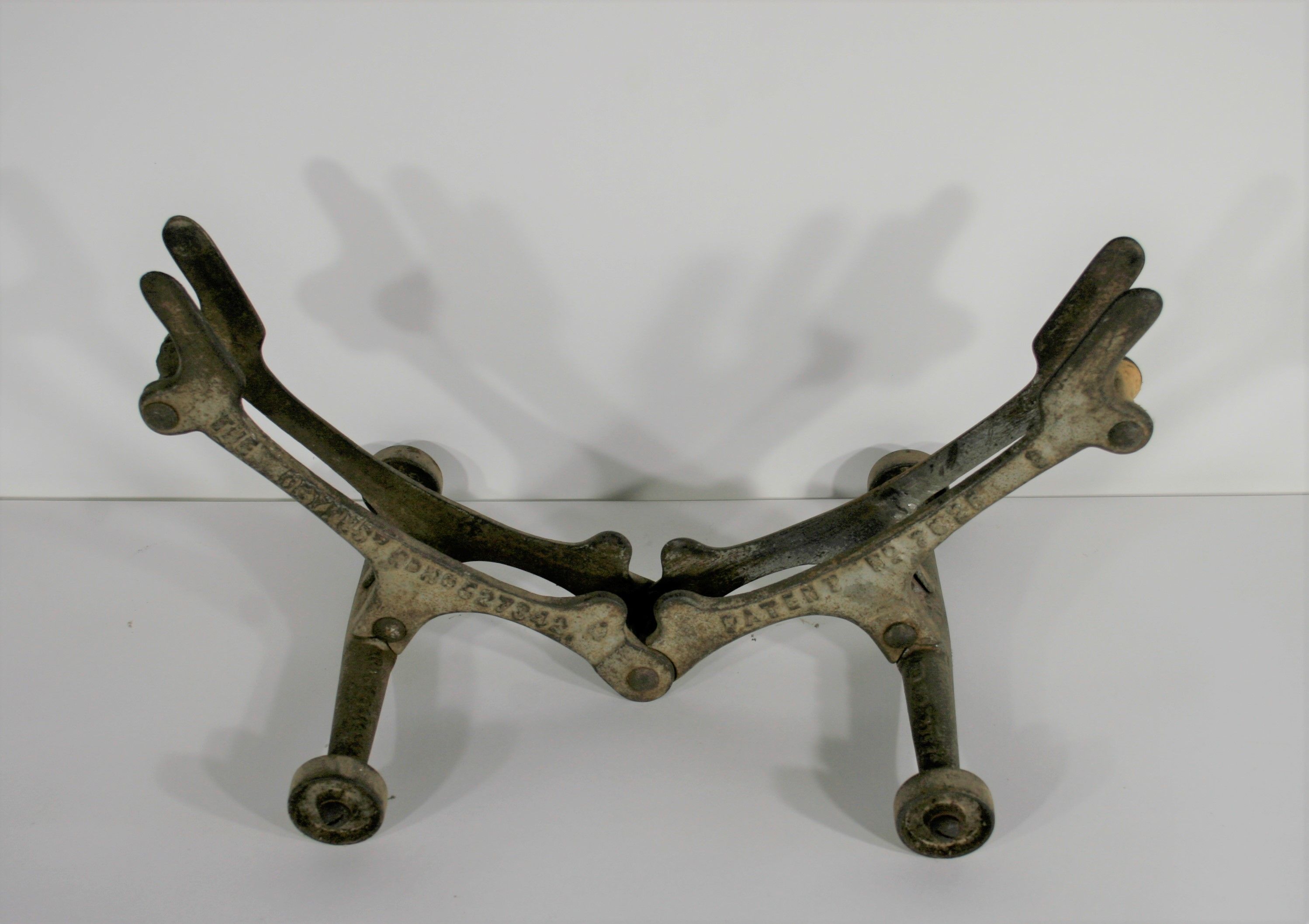 Bonhams Cars : 'The Ogypus' cast iron cycle stand, registered design ...