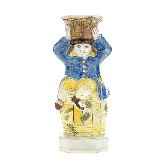 Bonhams : A rare Prattware 'Boy on a Barrel' Toby Jug, circa 1800
