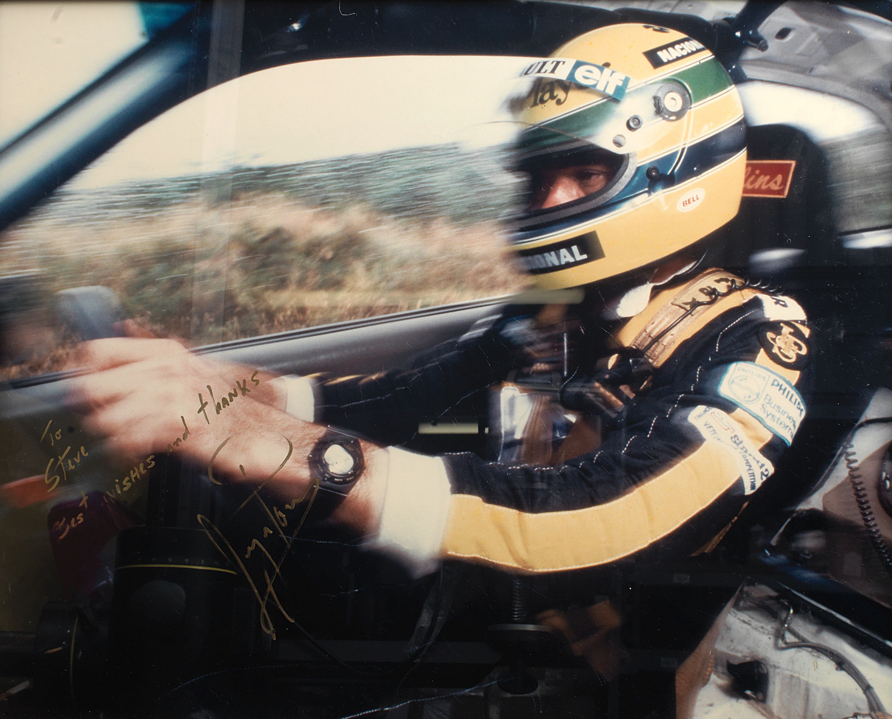 Bonhams Cars : A signed photograph of Ayrton Senna in an RS Cosworth ...