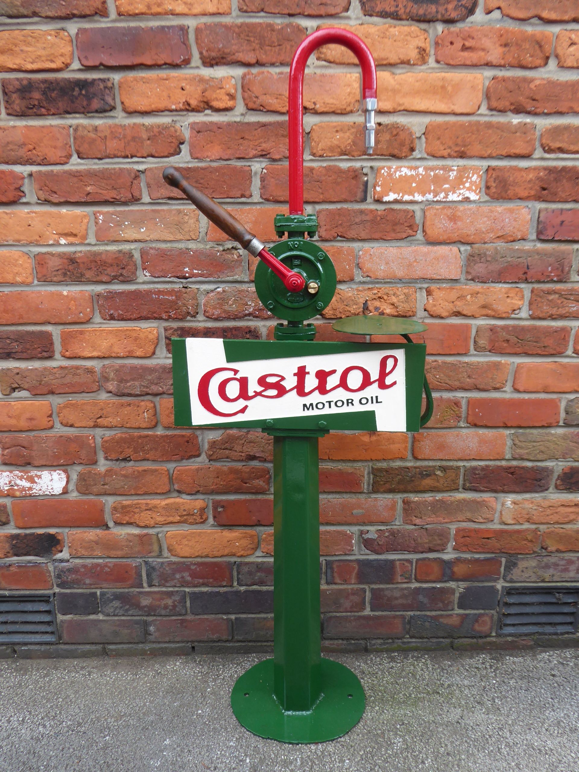 Bonhams Cars : A Castrol Bulk hand operated oil tank pump,