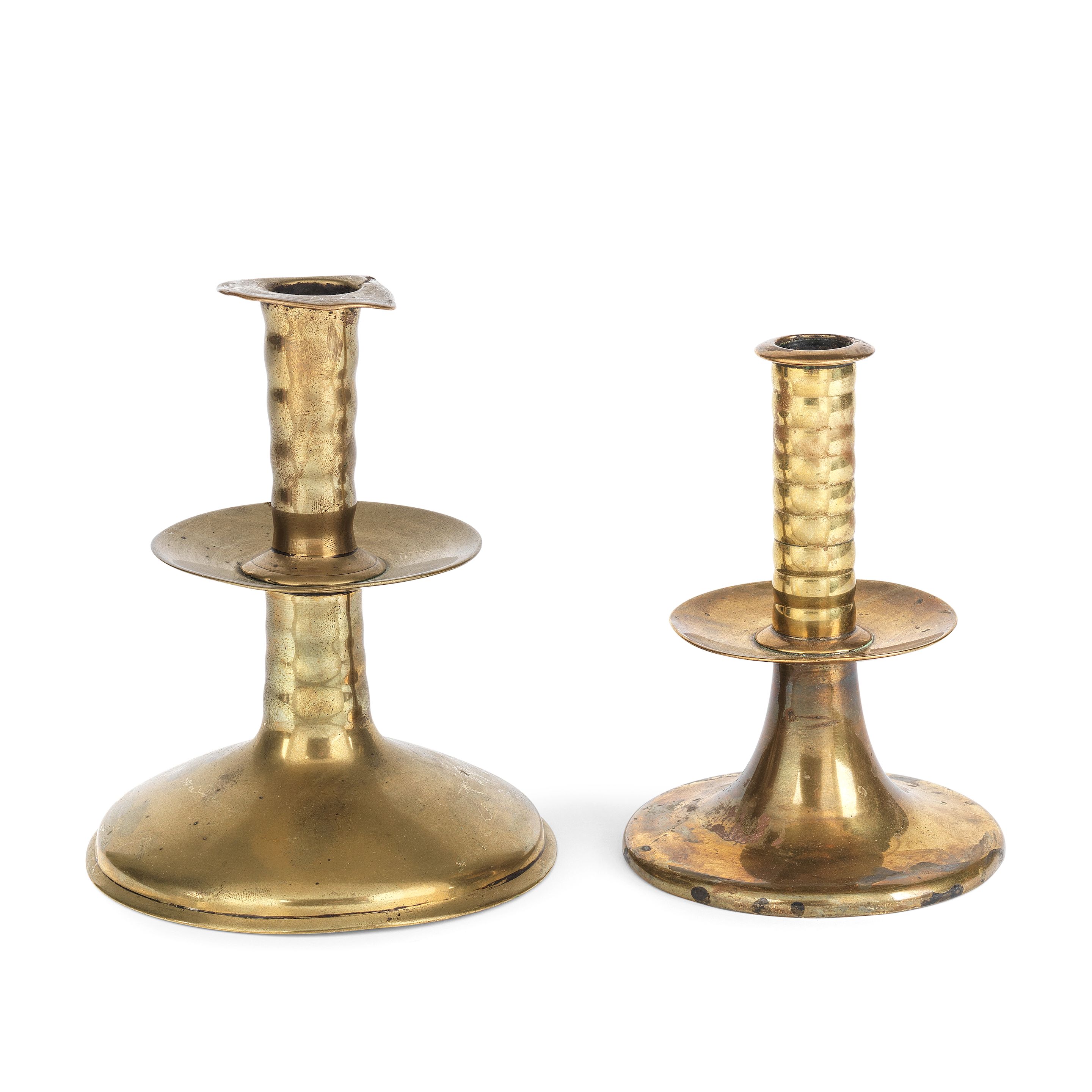 Bonhams : Two brass trumpet-base candlesticks English, mid-17th century (2)