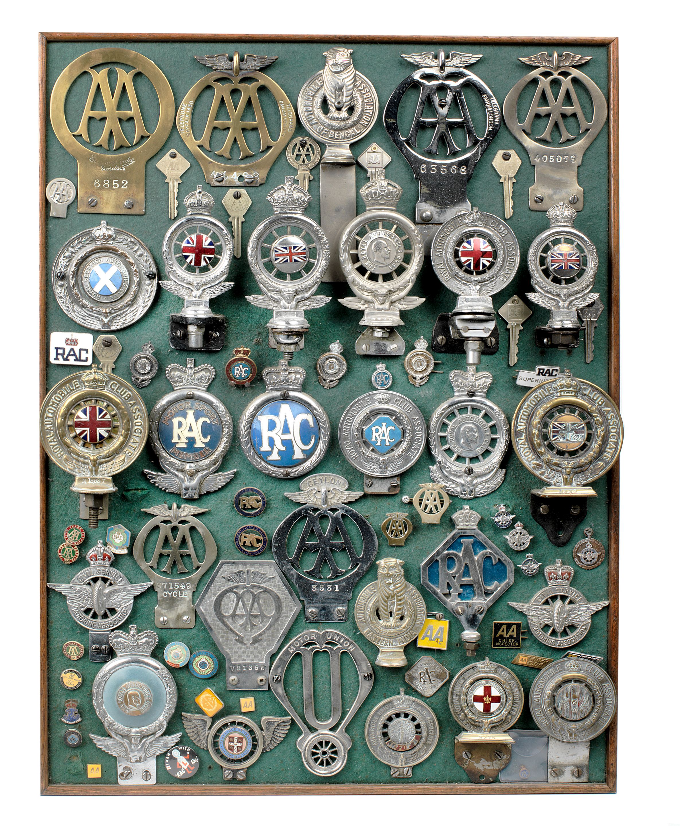 Bonhams Cars : A display board of RAC and AA badges and related lapel ...