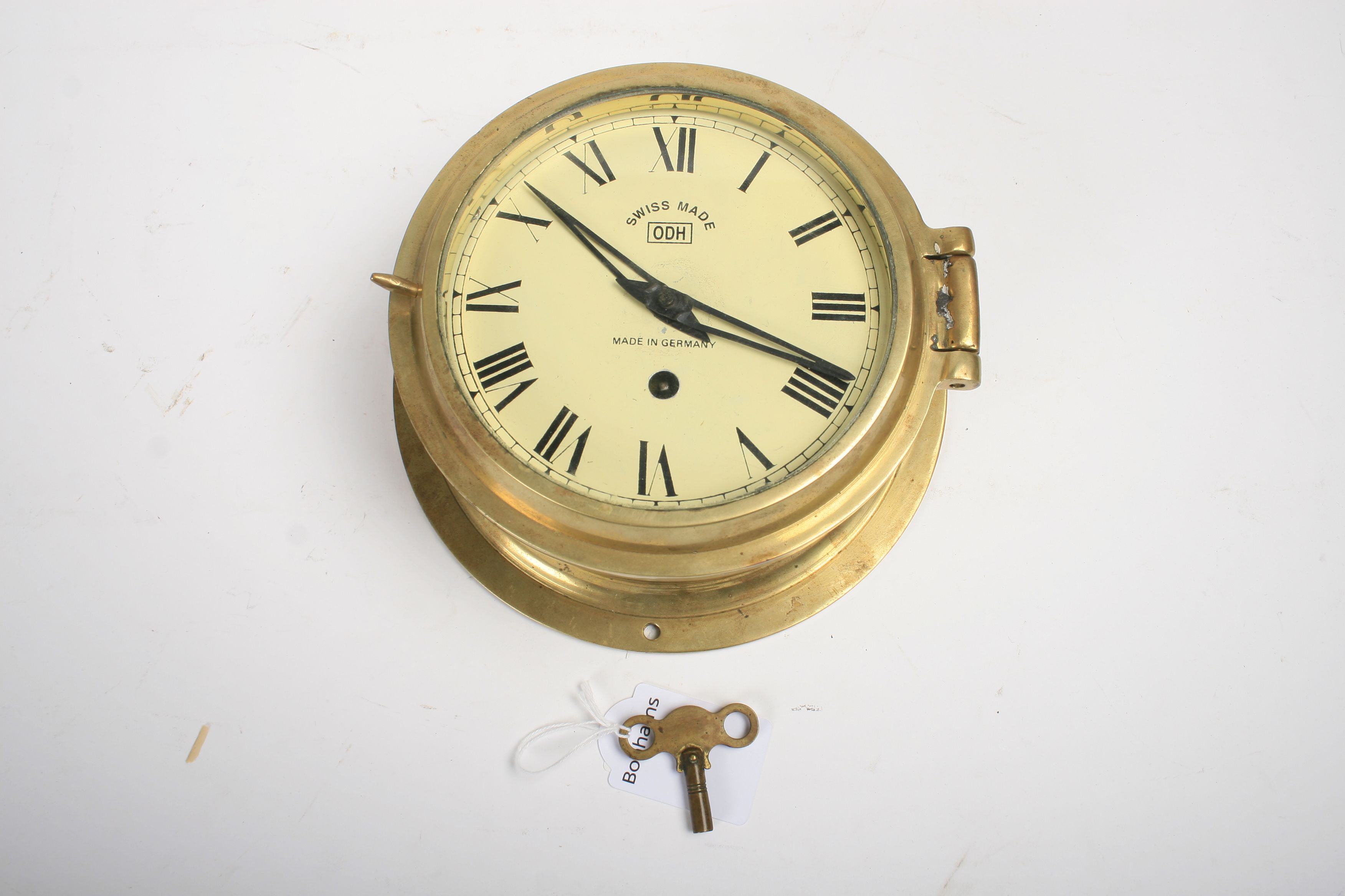 Bonhams Cars : A German brass bulkhead clock with Swiss movement by ODH ...