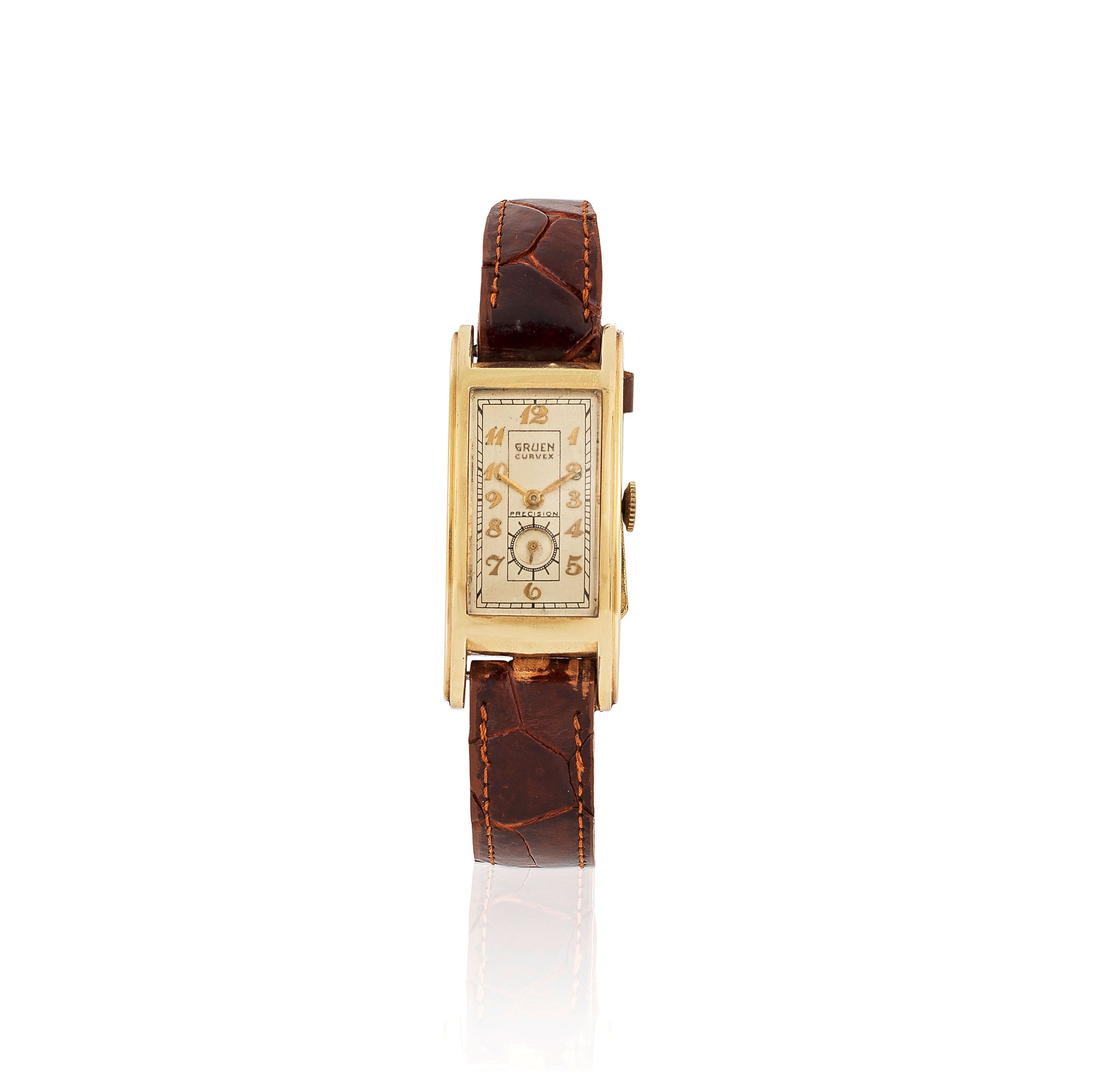 Bonhams : Gruen. An unusual gold plated manual wind curved rectangular ...